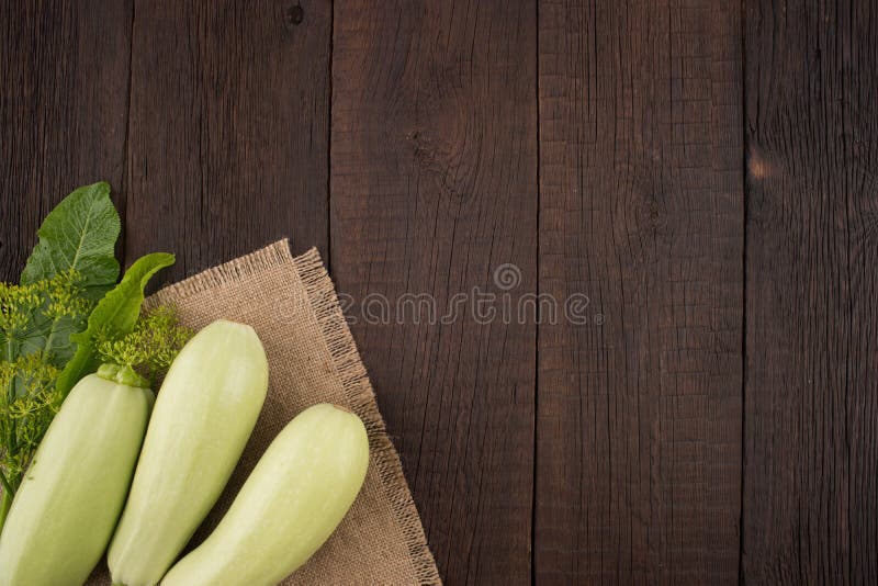 Courgettes on an Old Wooden Table. Stock Image - Image of eating ...