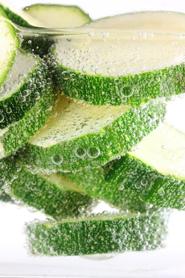 Courgettes Sliced in Water Cooking Stock Photo - Image of fresh, bubble ...