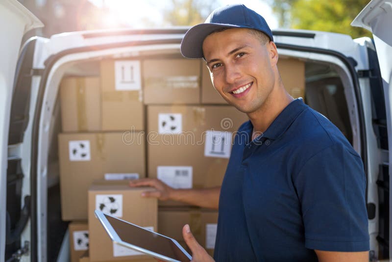 Courier Checking the Deliveries in His Van Stock Image - Image of ...