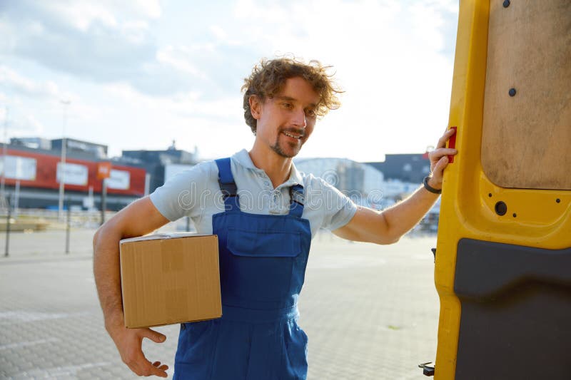 Courier Closing Delivery Van after Shipment Inspecting before ...