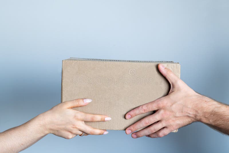 The Courier Delivered the Package To the Recipient Stock Photo - Image ...