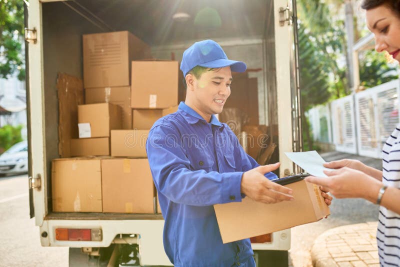 Courier delivering parcel stock photo. Image of shipping - 135269074