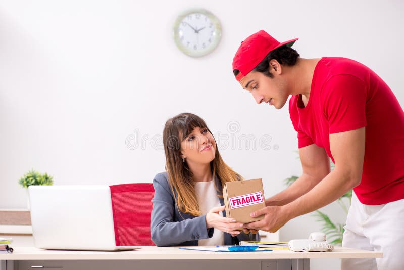 The Courier Delivering Parcel To the Office Stock Image - Image of ...