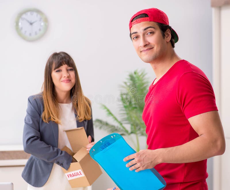 Courier Delivering Parcel To the Office Stock Image - Image of opening ...