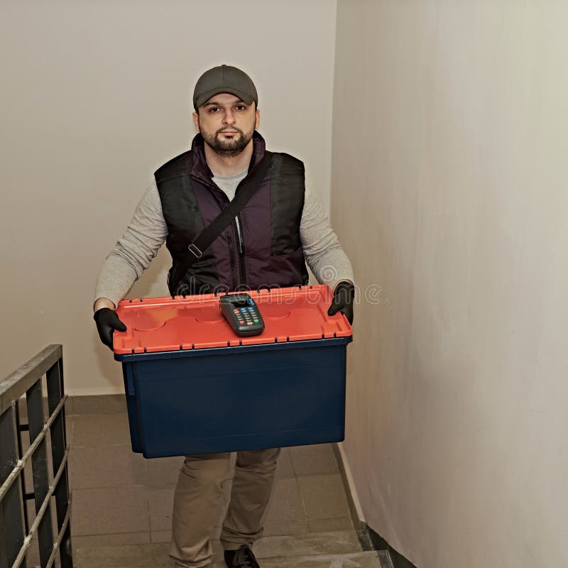 The Courier Delivers the Goods. Delivery in Boxes and Packages. Stock ...