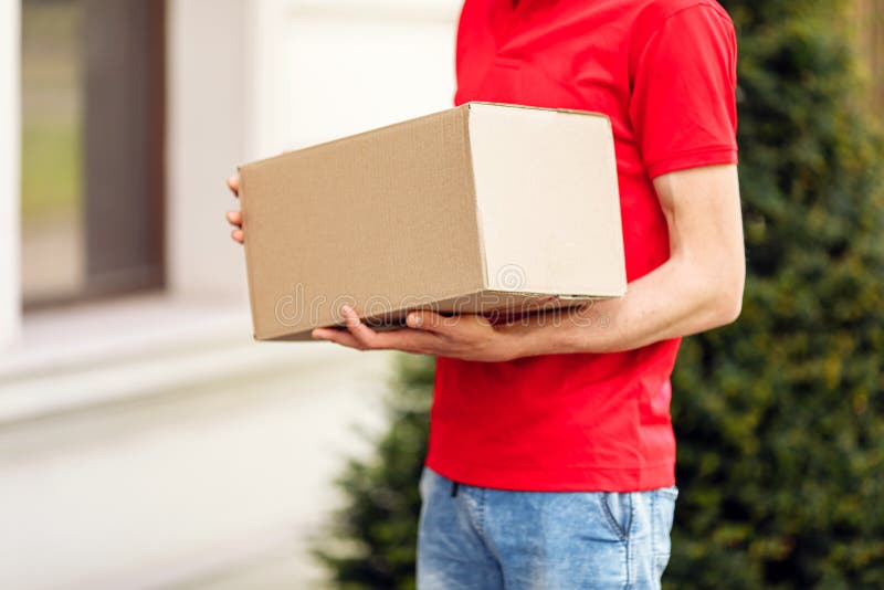 Courier Delivery Service with Parcels in Hand in the Open Air Stock ...