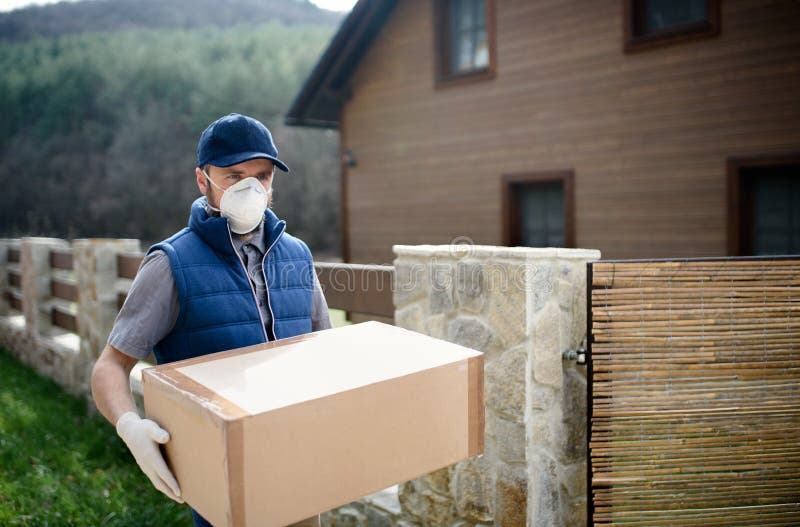 Courier with Face Mask Delivering Parcel, Corona Virus and Quarantine ...