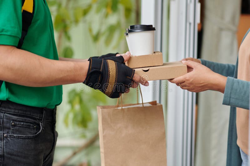 Courier Giving Order stock image. Image of delivery - 275969389
