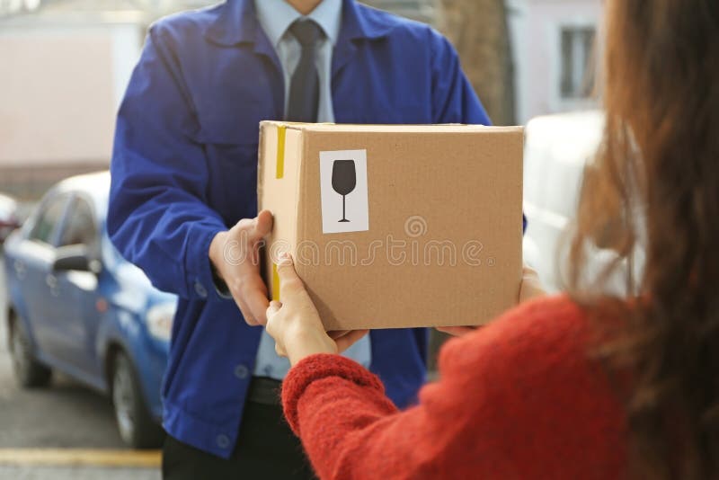 Courier Giving Parcel To Customer, Stock Image - Image of order, hands ...