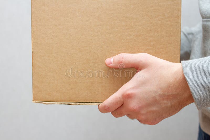 Courier Hands Packaging Parcel, Closeup Stock Image - Image of ...