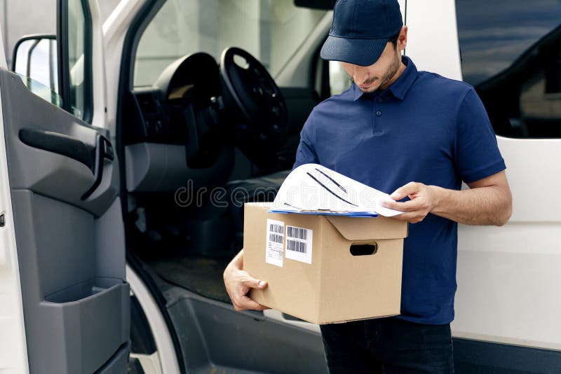 Delivery man at work stock image. Image of postal, package - 224812039