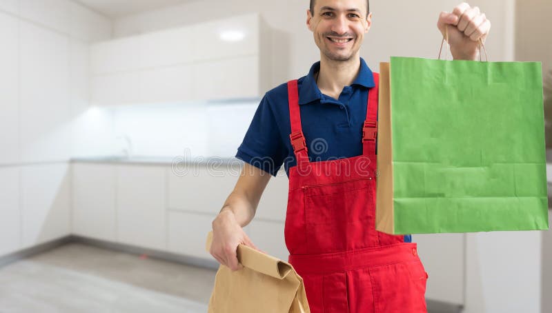 Courier Holding Paper Bags with Food, Space for Text. Delivery Service ...
