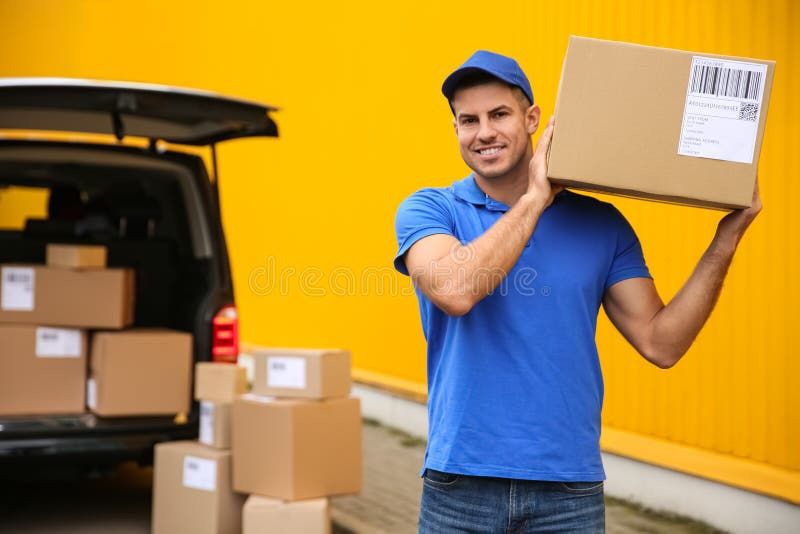 Courier with Parcel Near Delivery Van Outdoors. Space for Text Stock ...