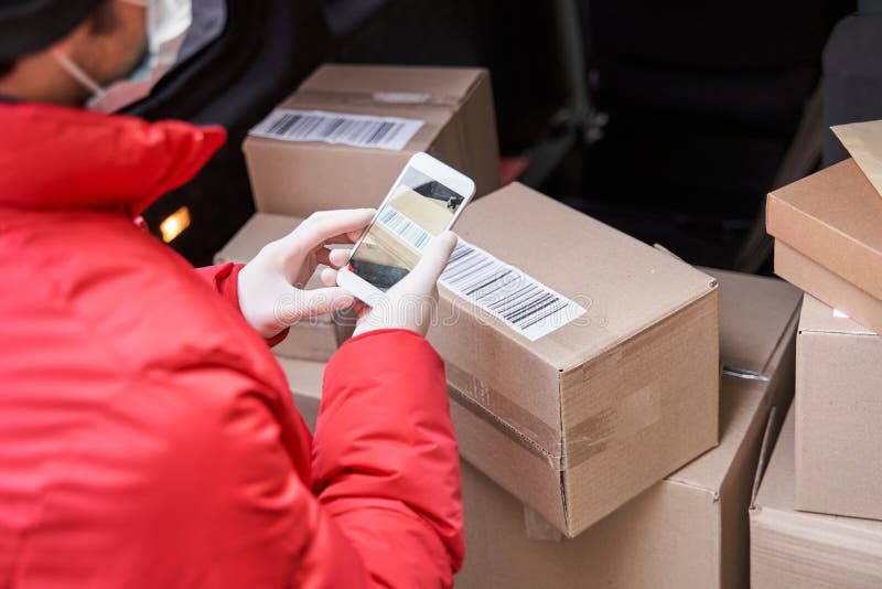 Courier in Protective Mask Scanning a Barcode Stock Image - Image of ...