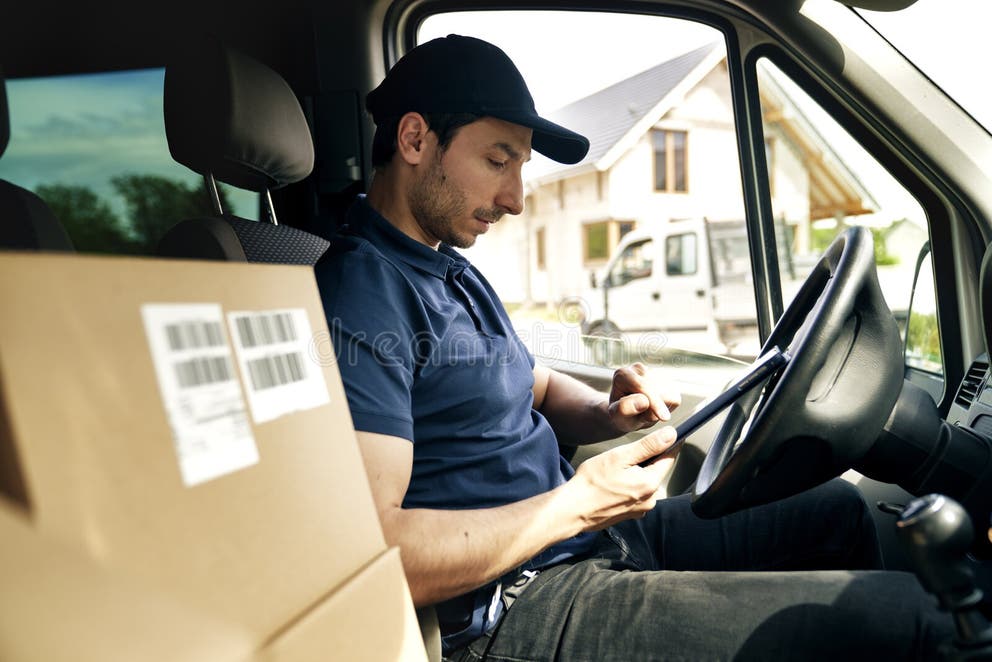 Delivery man at work stock photo. Image of industry - 224811346