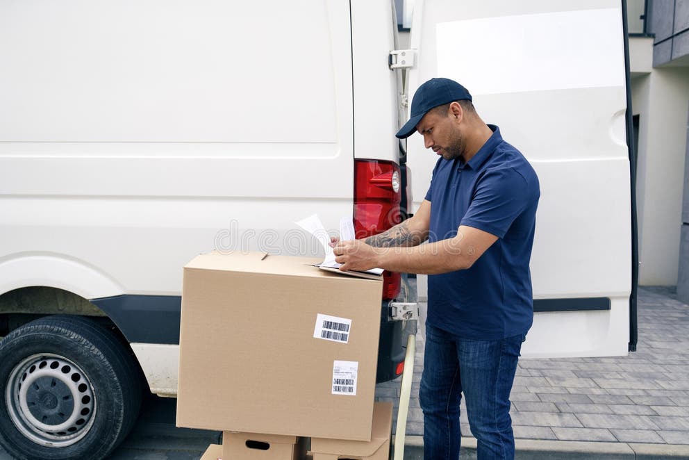 Delivery man at work stock image. Image of packaging - 224812119