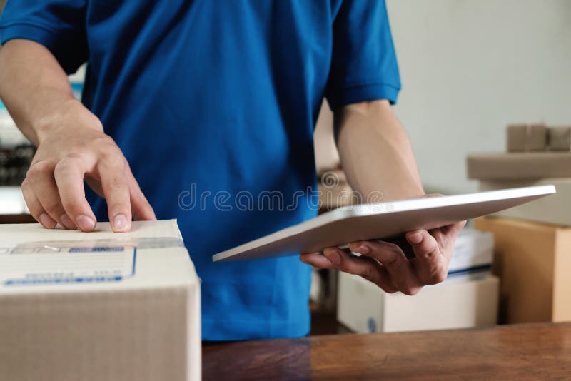 Courier Checking the Delivery Receipt in Office. Stock Photo - Image of ...