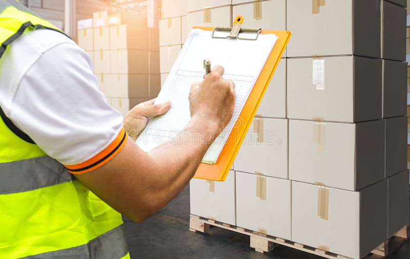 Worker Holding Clipboard and Writing on Paper. Ckecking Order Package ...