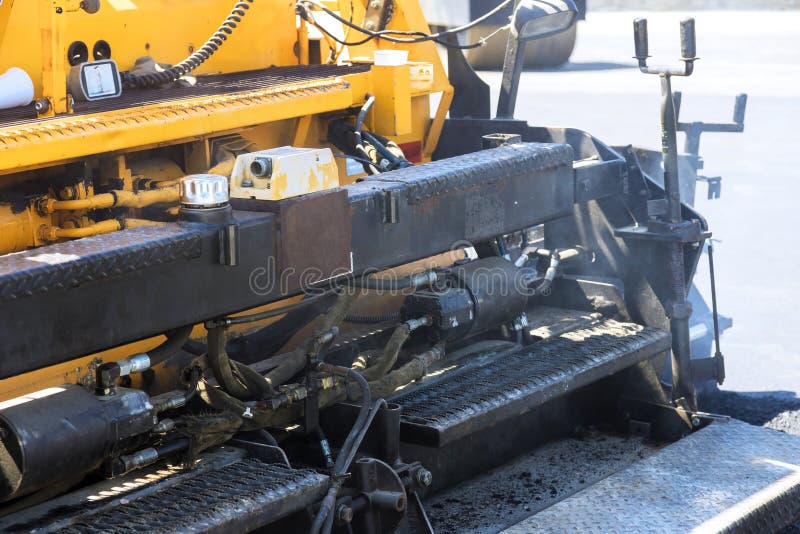 Pavement Machine Laying Fresh Asphalt or Bitumen Stock Photo - Image of ...