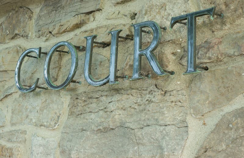 Court stock image. Image of lettering, stone, wall, metal - 43814971