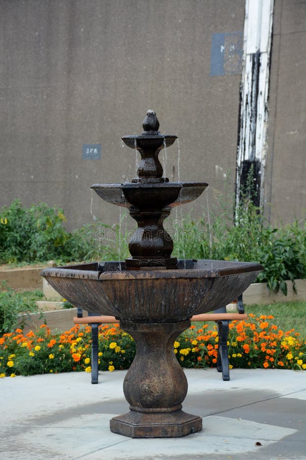 Courtyard fountain stock image. Image of courtyard, benches - 58769613