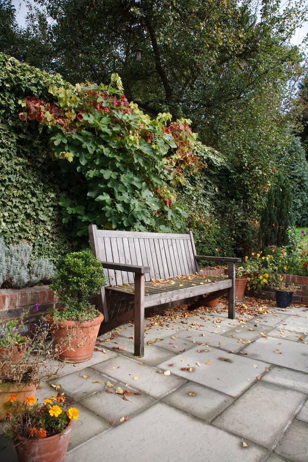 Garden bench in fall stock image. Image of english, backyard - 21108459