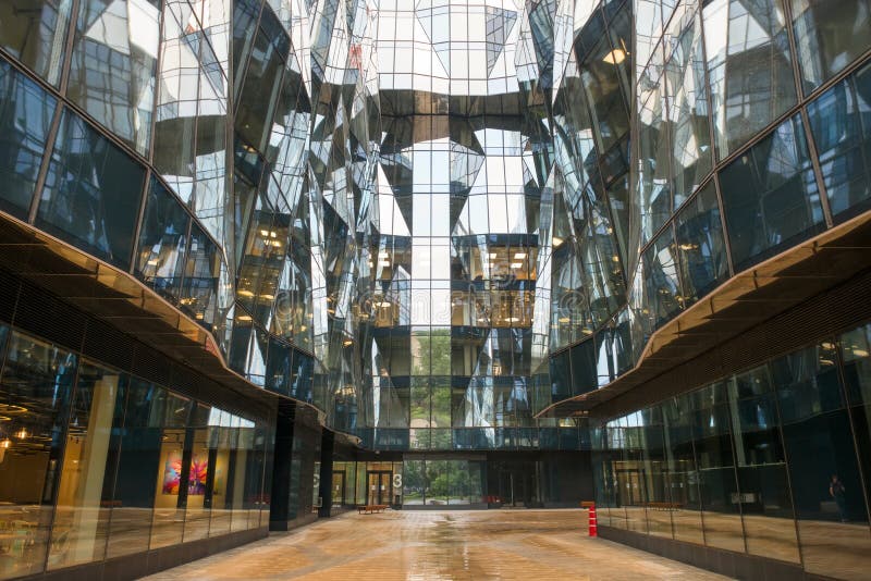 Glass building entrance stock photo. Image of distorted - 228855640