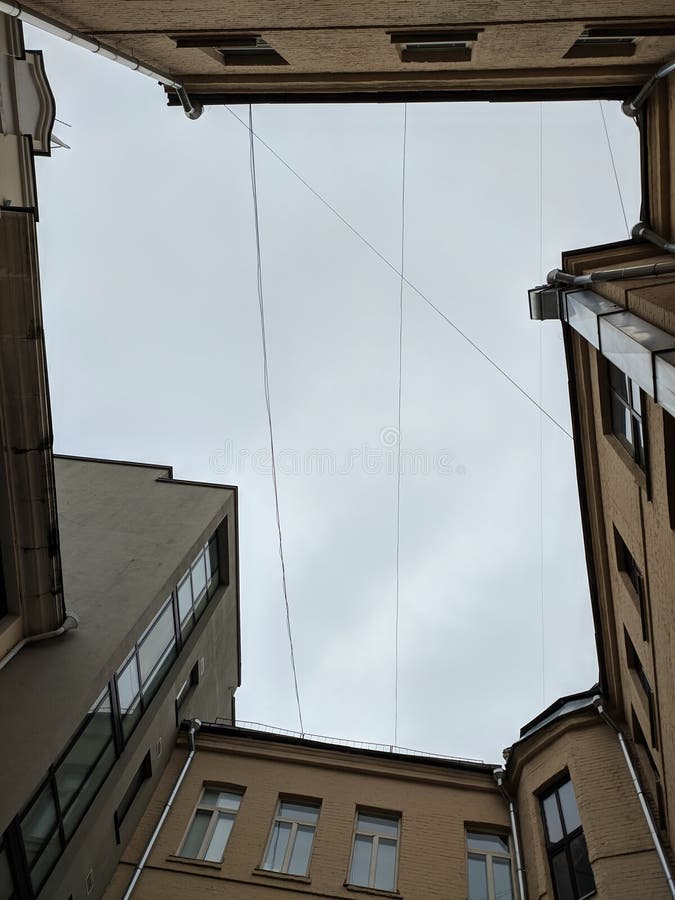 A Courtyard with a Low Angle View. Sky Surrounded by Stock Image ...