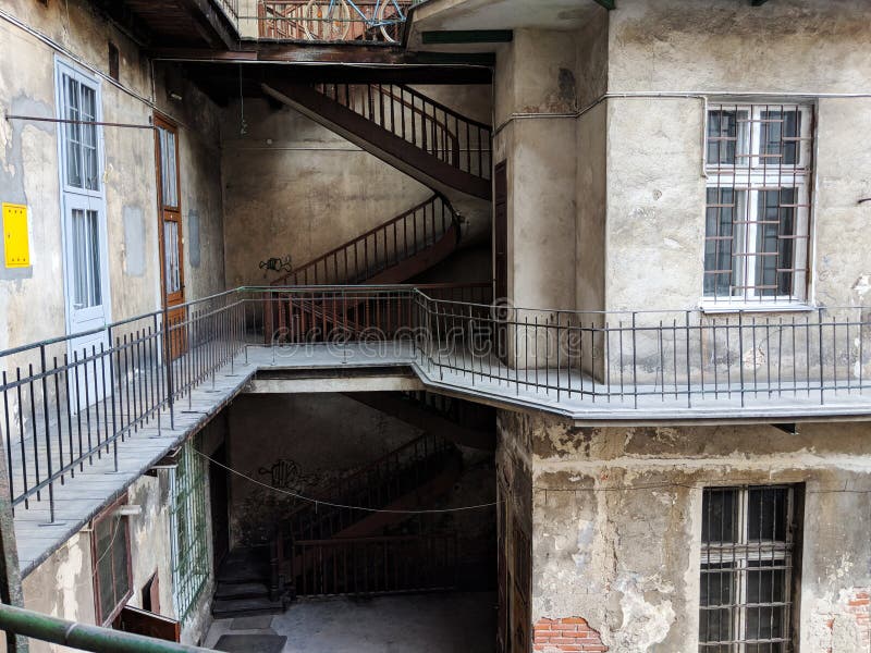 Courtyard of an Old, Pre-war Apartment Building with Falling Plaster ...