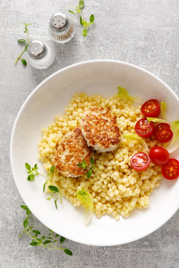 Couscous with Chicken Patties, Cutlets and Tomatoes, Top Down View ...
