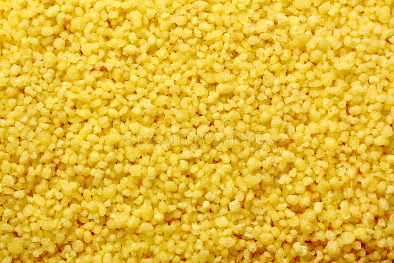 Dry Couscous Close-up in a Wooden Bowl on a Bamboo Stand. Concept of ...