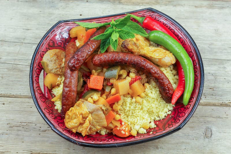 Couscous Dish with Chicken and Merguez Stock Photo - Image of ...