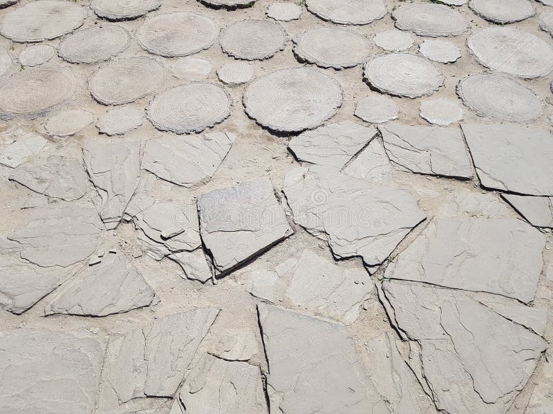 Coverage of Flat Stones with Sharp Edges and Wooden Saw Cuts on Dusty ...