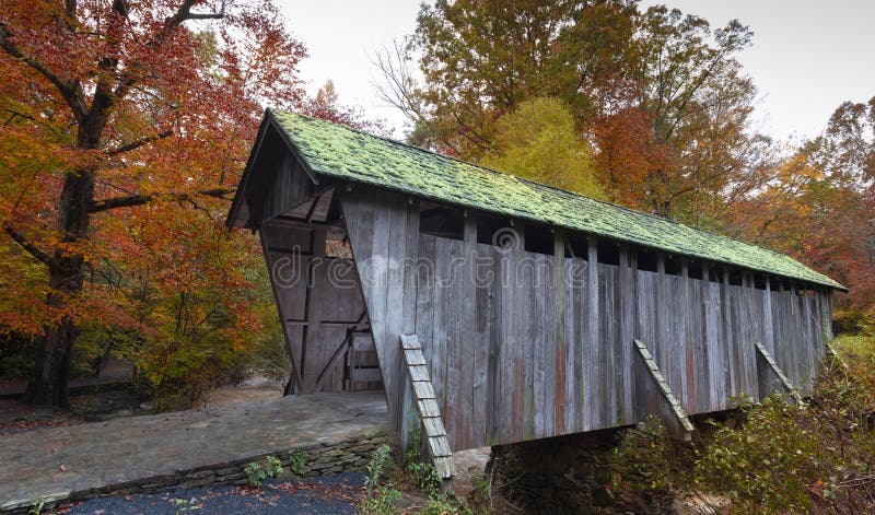 Covered bridge in the fall stock photo. Image of creek - 161099306