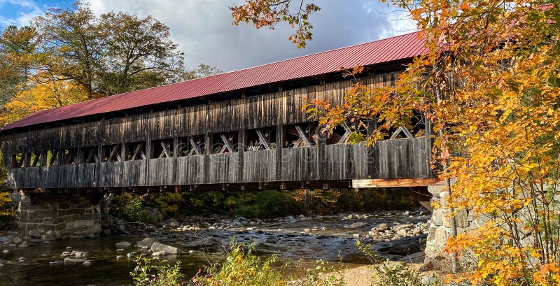 Covered Bridge in New Hampshire with People on the Bridge Stock Image ...