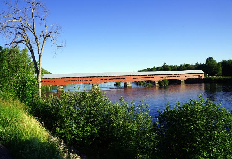 Covered bridge in Quebec stock photo. Image of long - 324499536