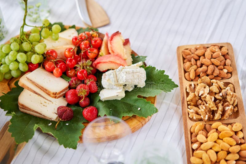 A Covered Buffet Table for a Master Class. Cheeses, Fruits and Nuts ...
