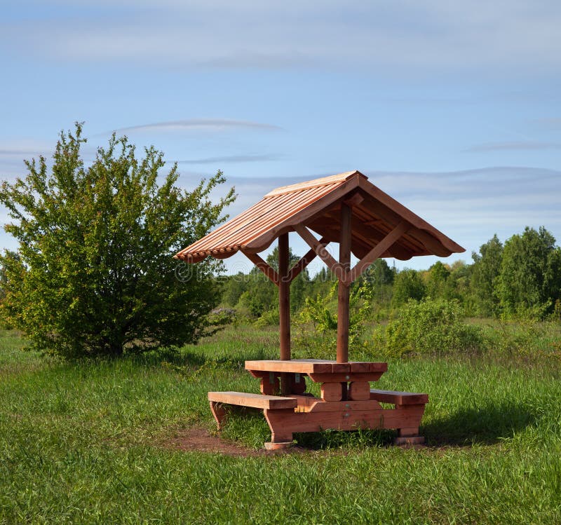Covered park bench stock photo. Image of area, horizontal - 153813810