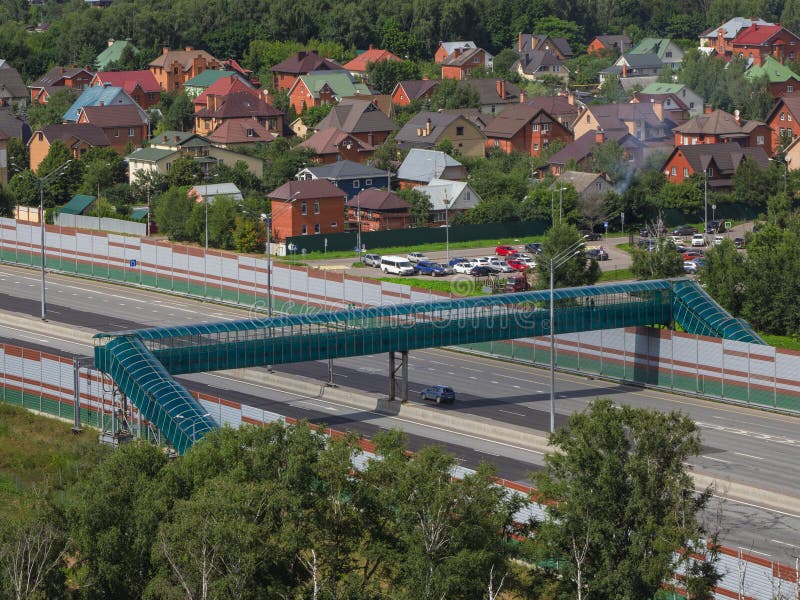 Covered Pedestrian Bridge Over the Highway. Pedestrian Crosswalk Over ...