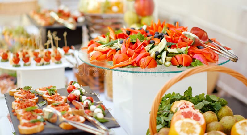 A Covered Self-service Table Organized Catering with Fruit Vegetables ...