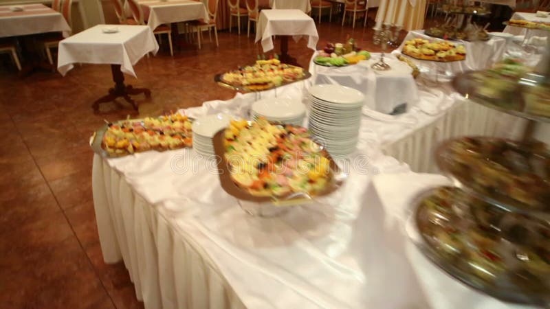 Covered Tables with Different Snacks in Restaurant Stock Video - Video ...