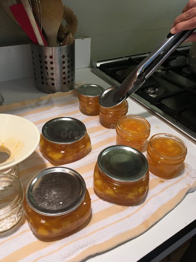 Covering Clean, Wiped Jars with Lids Stock Photo - Image of masonjars ...