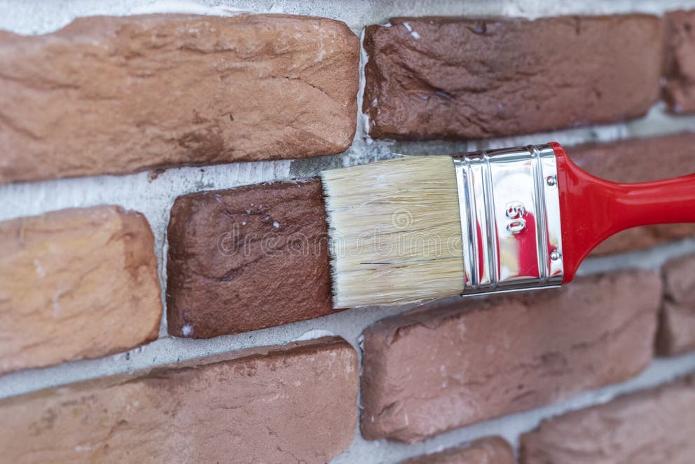 Covering of a Decorative Plaster Tile with a Protective Varnish. Stock ...