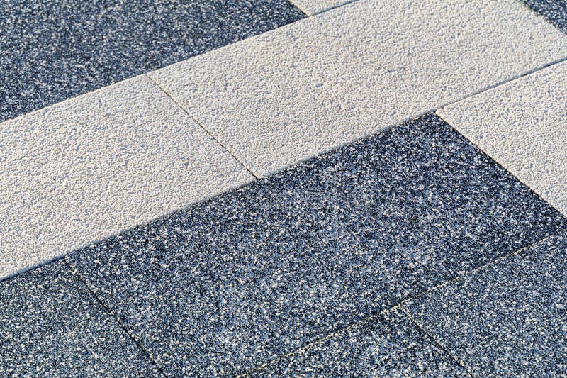 Covering the Footpath of Light and Dark Gray Tiles. Modern Textured ...