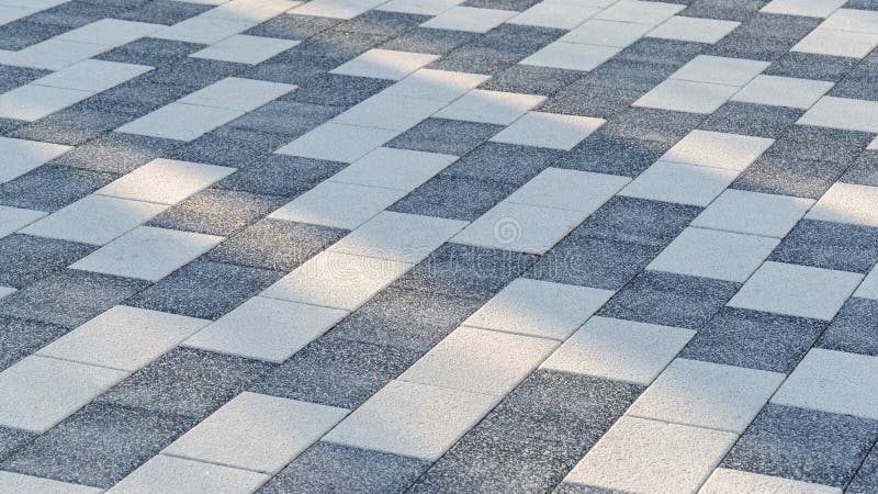 Covering the Footpath of Light and Dark Gray Tiles. Modern Textured ...