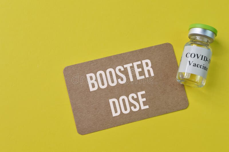 Covid-19 Bottle Vaccination and Brown Card with Text BOOSTER DOSE Stock ...
