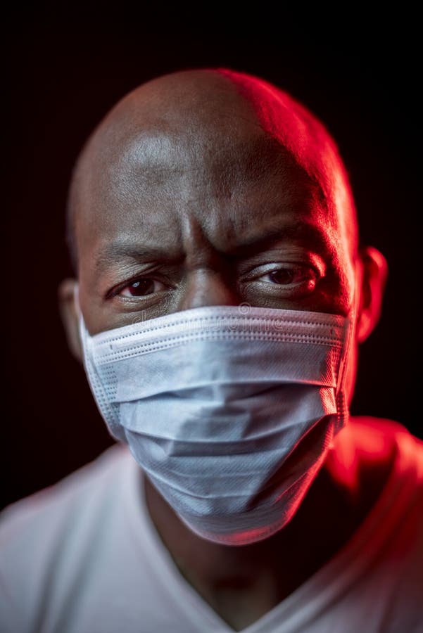 COVID-19, Concerned Black Man with Protective Mask Stock Photo - Image ...