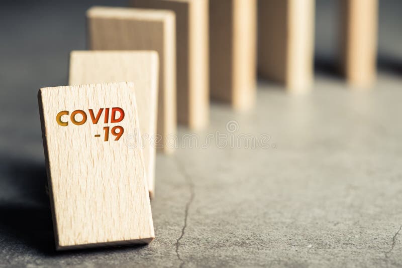 Covid-19 Domino Falling stock image. Image of change - 196984327