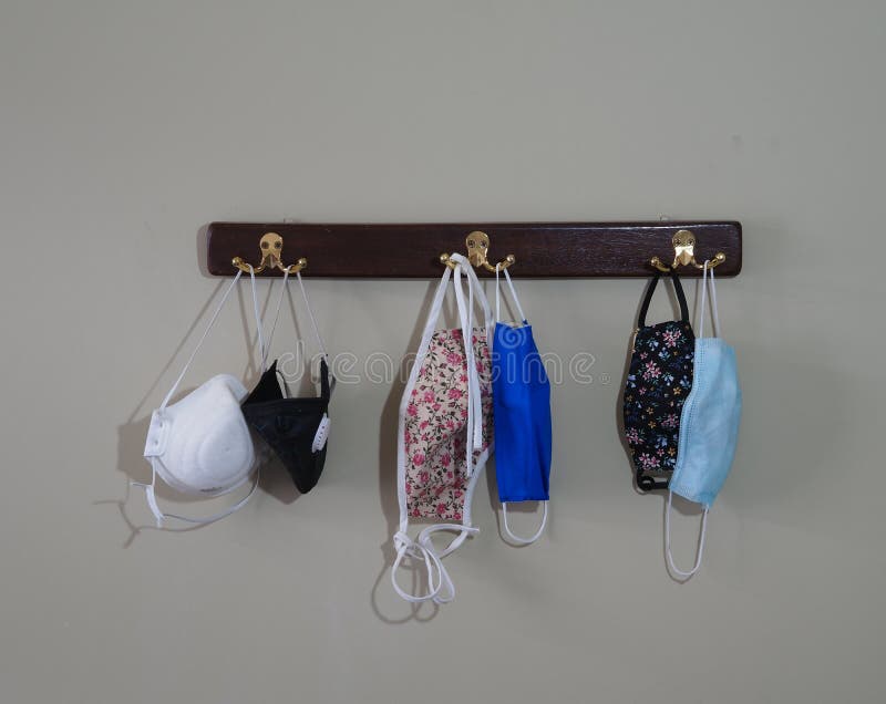 Covid Mask on the wall stock photo. Image of design - 206283074