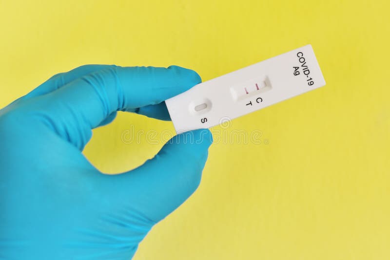 COVID-19 Positive Test by COVID-19 Antigen Test Kit Stock Photo - Image ...